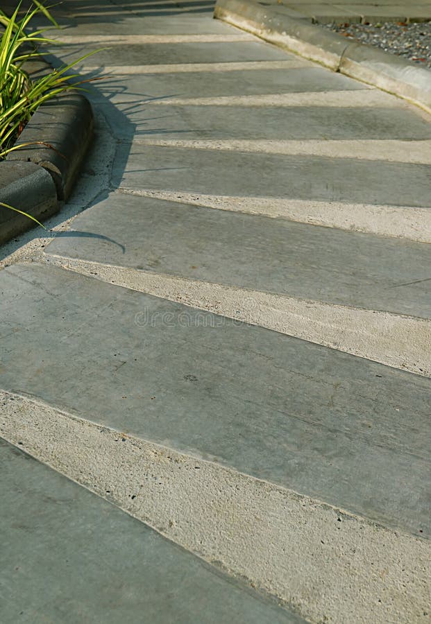 Empty Striped Curved Concrete Path in the Sunlight Stock Image - Image ...