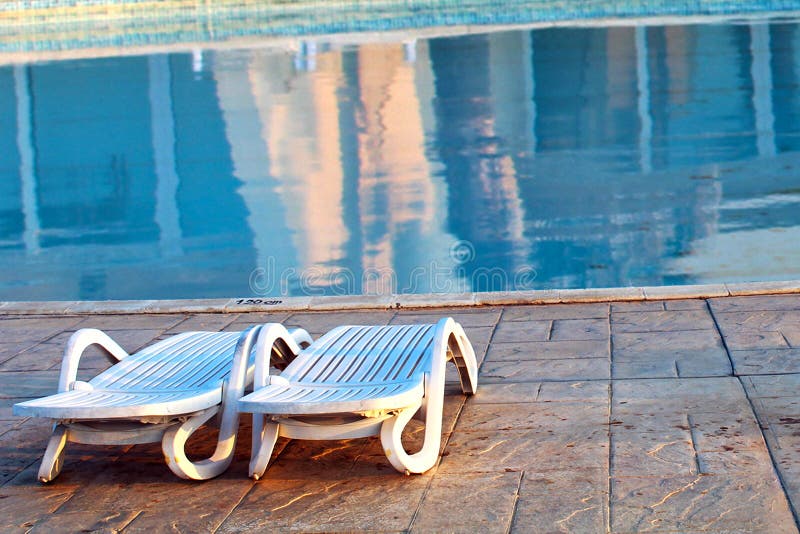 Empty Swimming Pool Chairs in Egypt Stock Photo - Image of borg ...