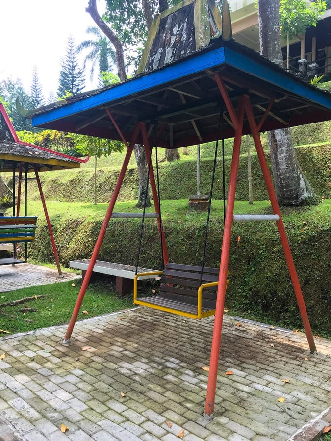 An Empty Swing with canopy stock image. Image of high - 259157007