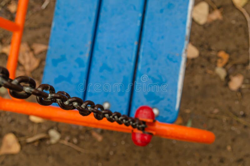 Empty Swing for Children on Chains Stock Photo - Image of iron ...