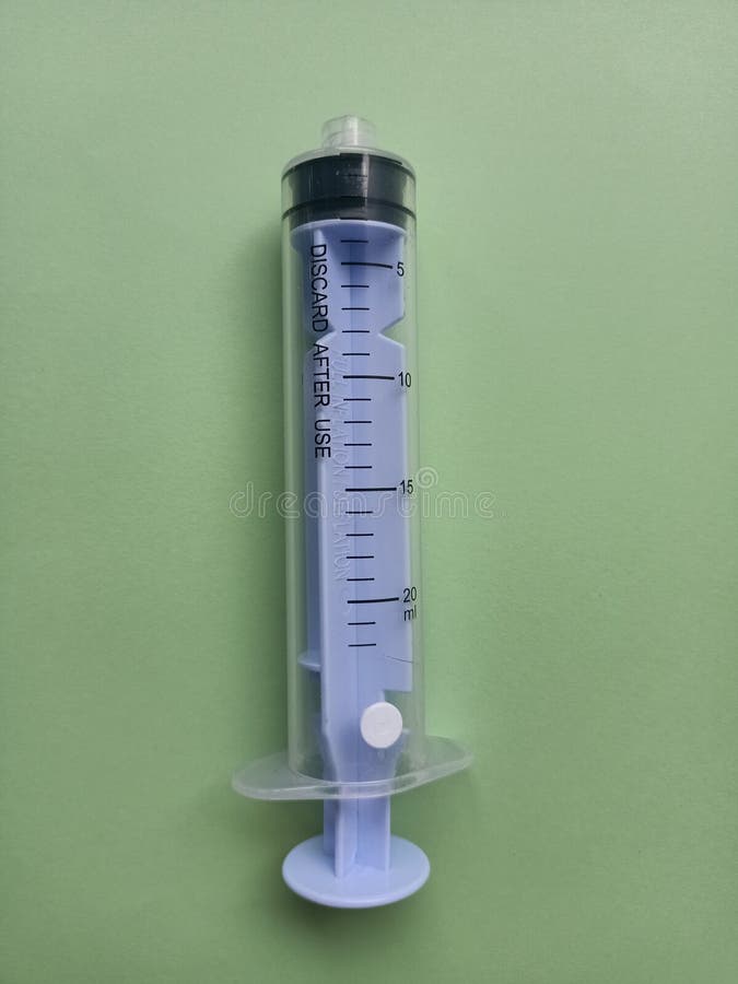 Empty Syringe Isolated on Green Paper Stock Image - Image of light ...