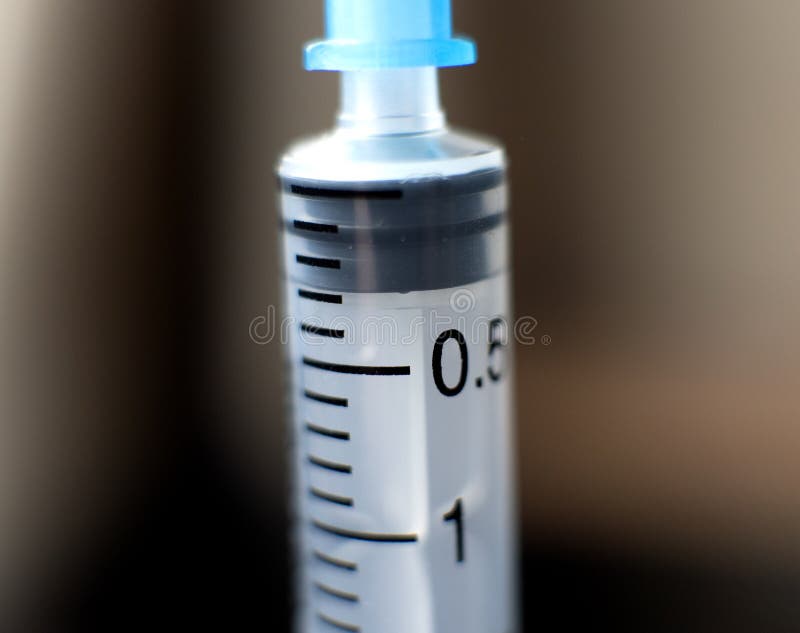 Empty Syringe Positioned on a Dark Surface Stock Photo - Image of ...