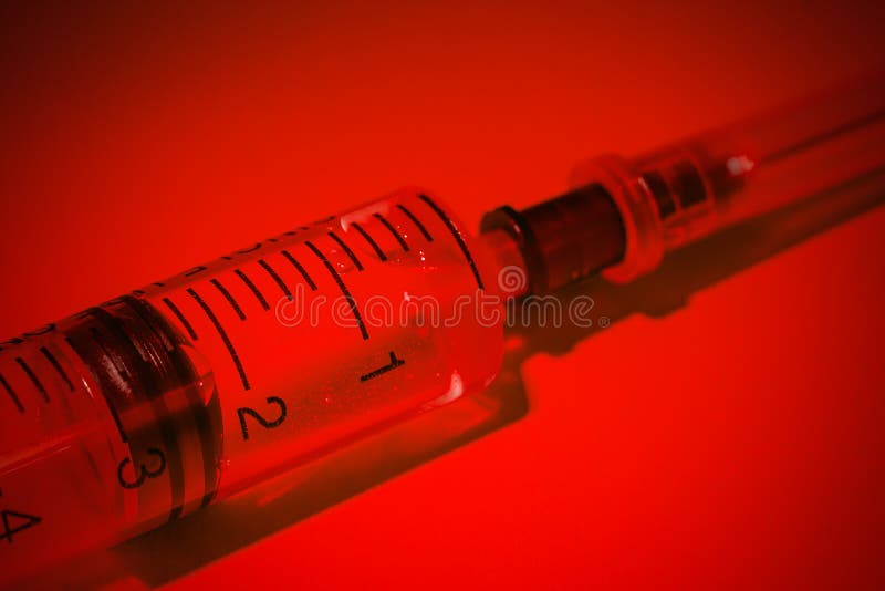 Empty Syringe on Red Background Close Up Stock Image - Image of syringe ...