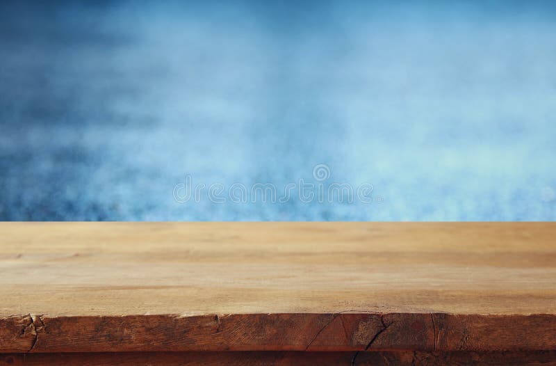 Empty Table in Front of Black and Gold Glitter Lights Background Stock ...