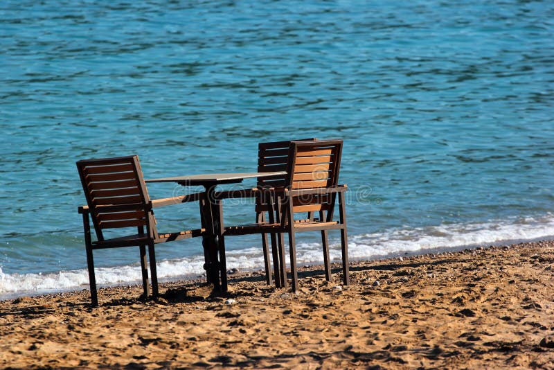 Empty Table with Three Seats on a Beach Stock Photo - Image of cafe ...