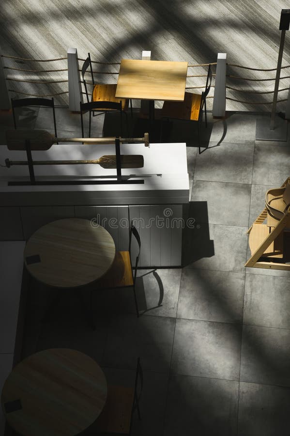 Empty Tables and Chairs in a Cafe Restaurant with Natural Sunlight and ...