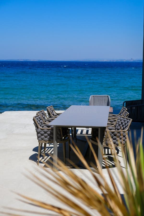 Empty Tables and Chairs of a Restaurant on a Terrace Overlooking the ...