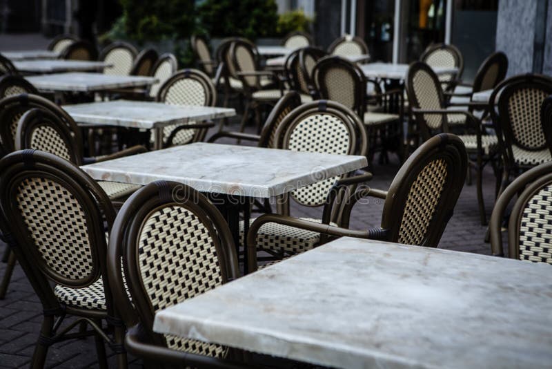Empty tables at restaurant stock photo. Image of summer - 63448952
