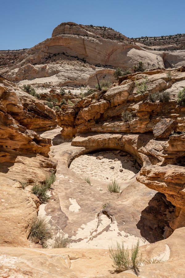Empty Tanks Below Desert Rocks in Capitol Reef Stock Photo - Image of ...