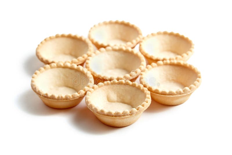 Empty Tartlet Shells Isolated on White. Group of Crispy Mini Tart ...