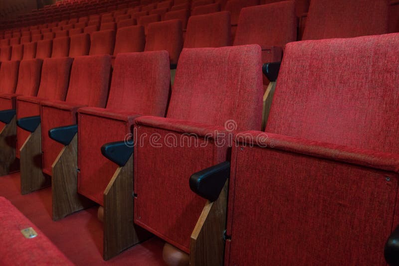 Red theater chairs stock photo. Image of drama, theater - 99885746