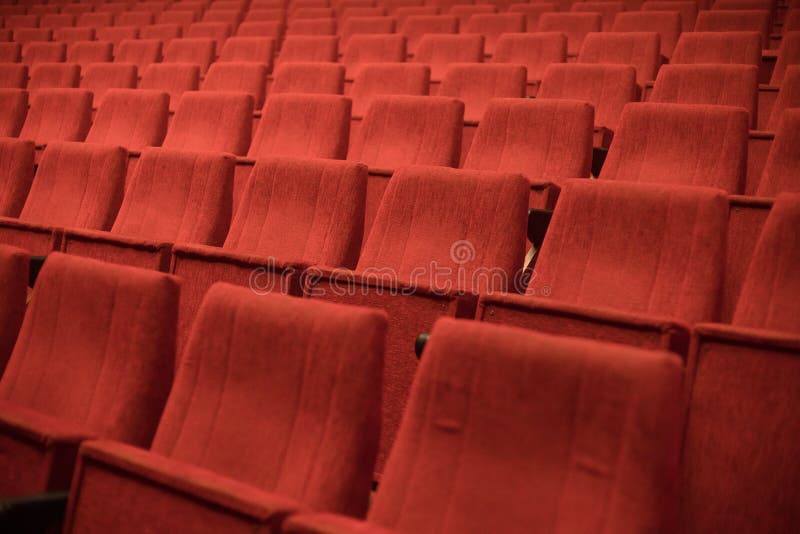 Red theater chairs stock photo. Image of indoor, public - 99886262
