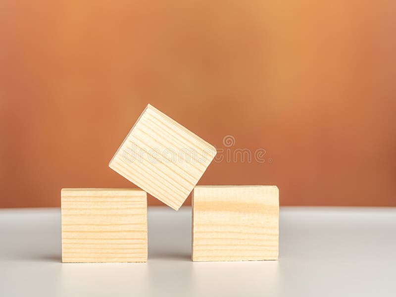 Empty Three Wooden Blocks on a White Table with a Vintage Background ...