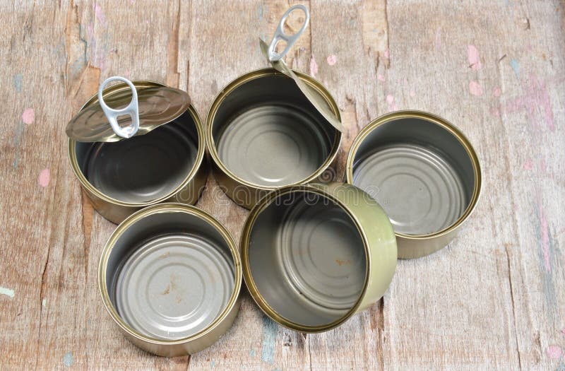 Empty tin can on floor stock image. Image of board, trash - 59966133