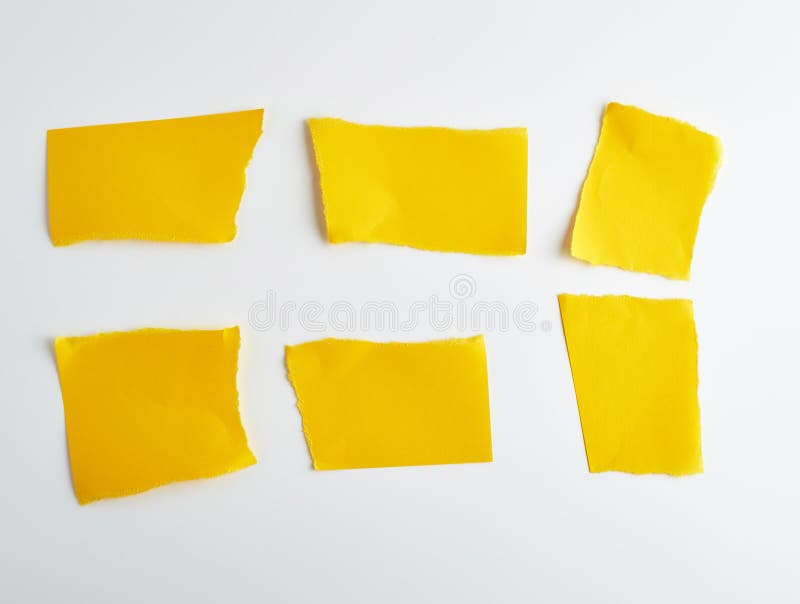 Ripped Yellow Pieces Of Paper Stock Photo - Image of group, paper: 39992934