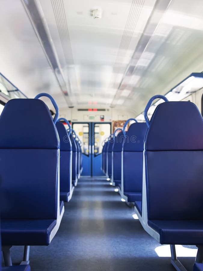 An Empty Train Car with Blue Leather Seats Stock Image - Image of ...