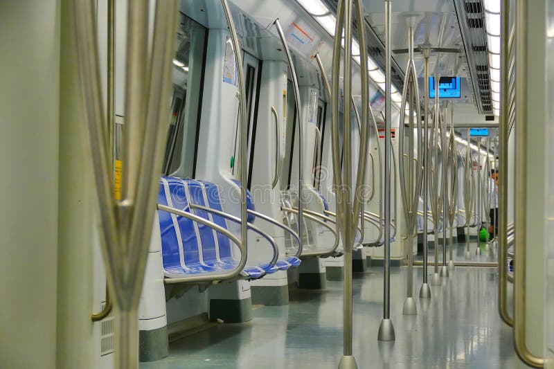 Empty Train Carriage with a Modern Interior and Blue Seats Stock Image ...