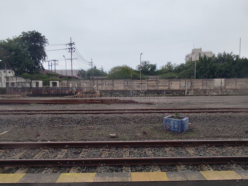 Empty Train Tracks Stretching Distance Under Cloudy Sky Stock Photos ...