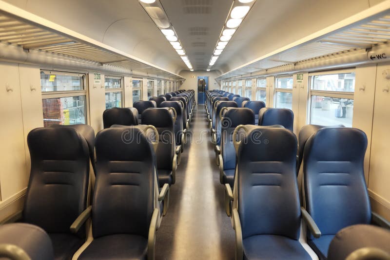 Empty Train Carriage with a Modern Interior and Blue Seats Stock Image ...