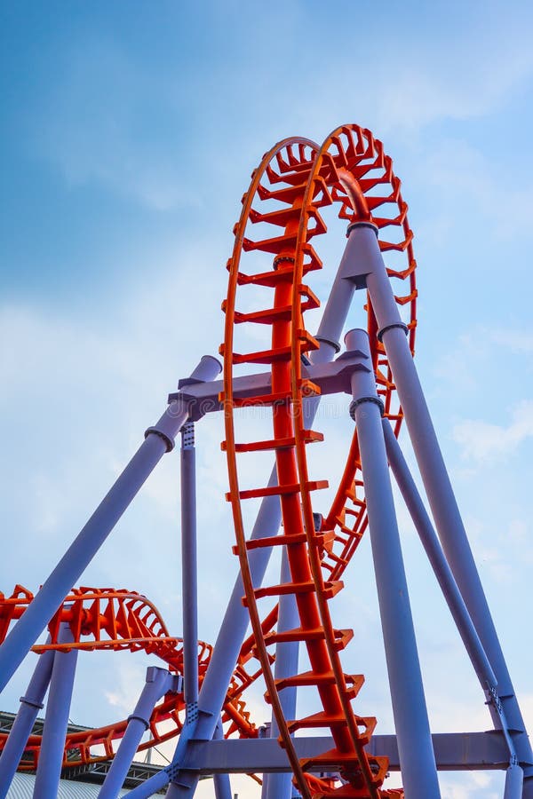 Empty Tram Rails or Loop Roller Coaster with Blue Sky in Amusement Park ...