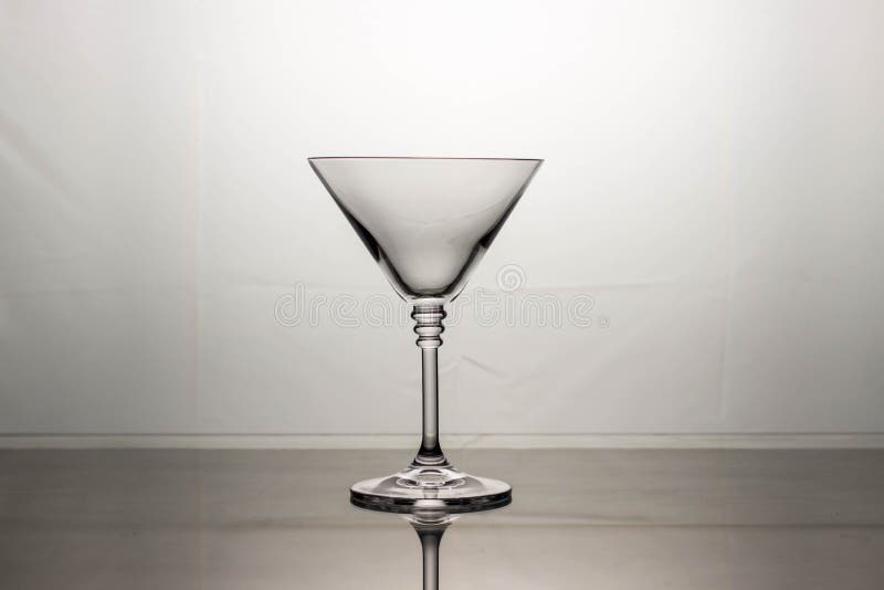 Empty Transparent Cocktail Glass on a Light Background Stock Photo ...