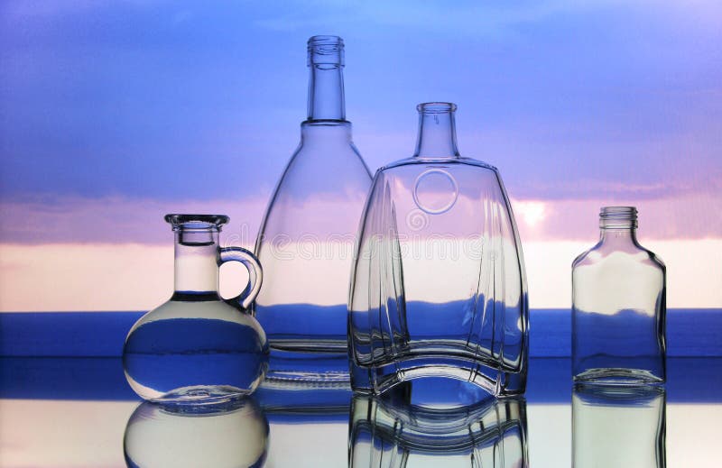 Empty Transparent Glass Bottles Forms Stock Photo - Image of diverse ...