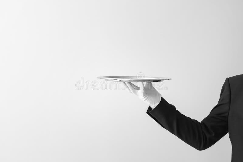 Hand of Waiter with Empty Tray on Light Background Stock Photo - Image ...