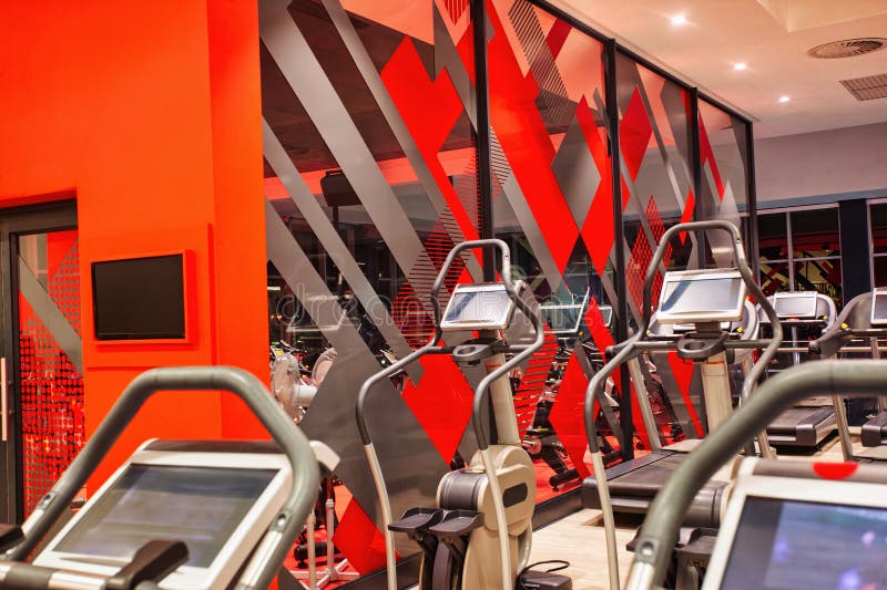 Empty Treadmill Class Studio at the Gym, Red Walls Stock Photo - Image ...