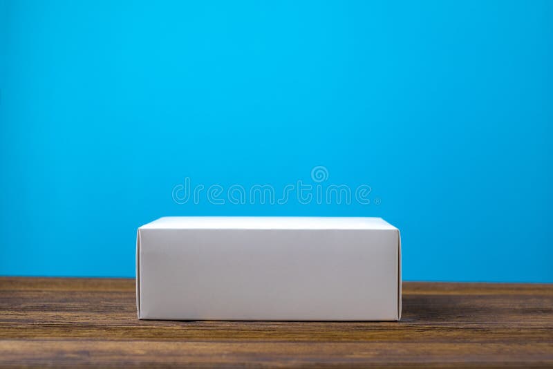 Empty Two Package White Cardboard Box for Long Items on Wooden T Stock ...