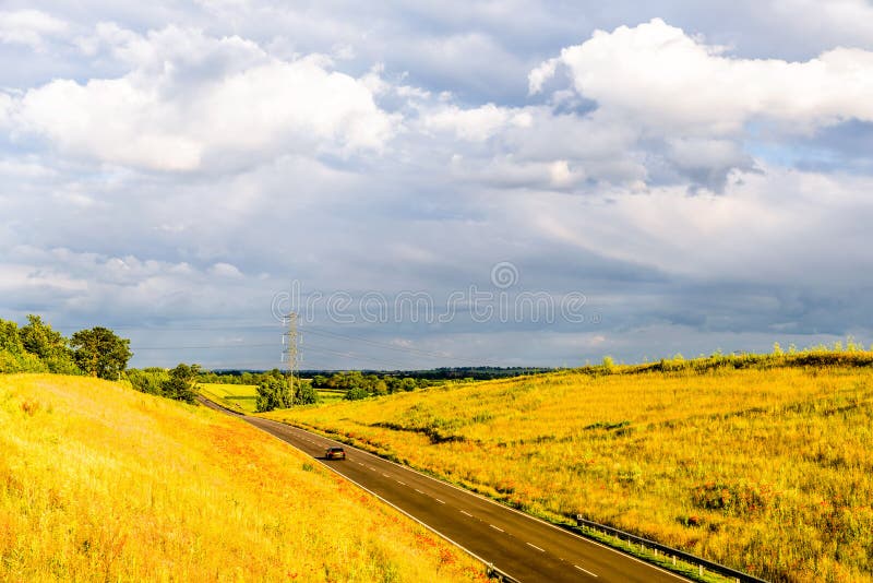 Empty Uk Motorway Across Colourful Field on Sunny Day Stock Image ...