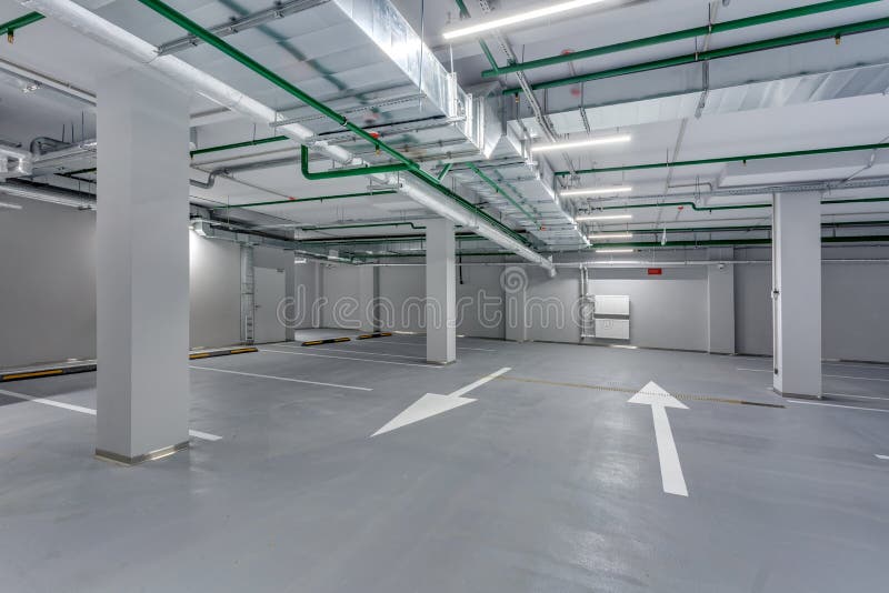 Empty Underground Garage Parking with Columns and Road Markings Stock ...