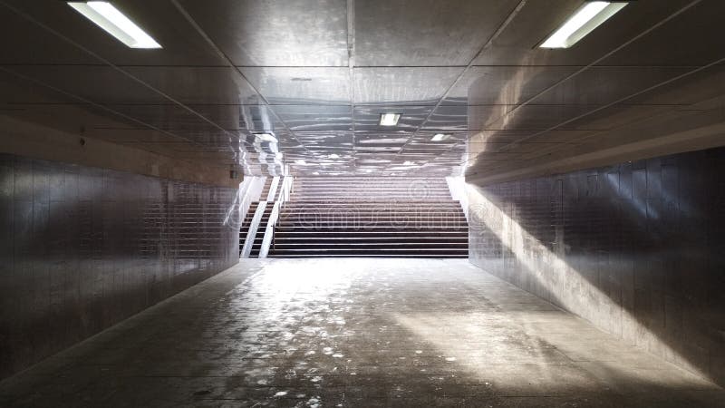 An Empty Underpass from the Inside, a Staircase on Which Bright ...