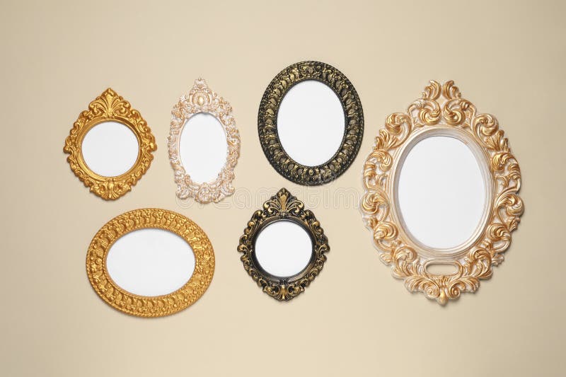 Empty Vintage Frames Hanging on Beige Wall Stock Image - Image of ...