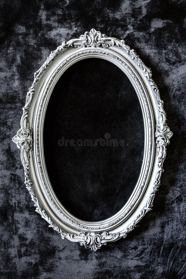 An Empty Vintage Oval Frame with a Distressed Silver Finish Set Against ...