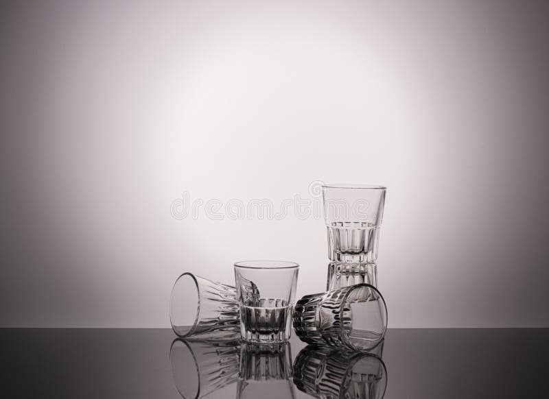 Empty Vodka Glasses are Built Like a Skyscraper with a Beautiful ...