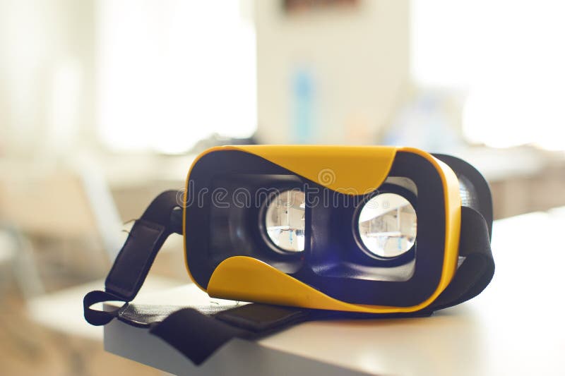 Empty VR Headset Lying on White Desk, Interior of Light Office on ...