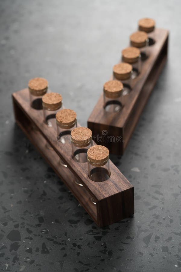 Empty Walnut Holder with Glass Tubes for Spices on Concrete Surface ...