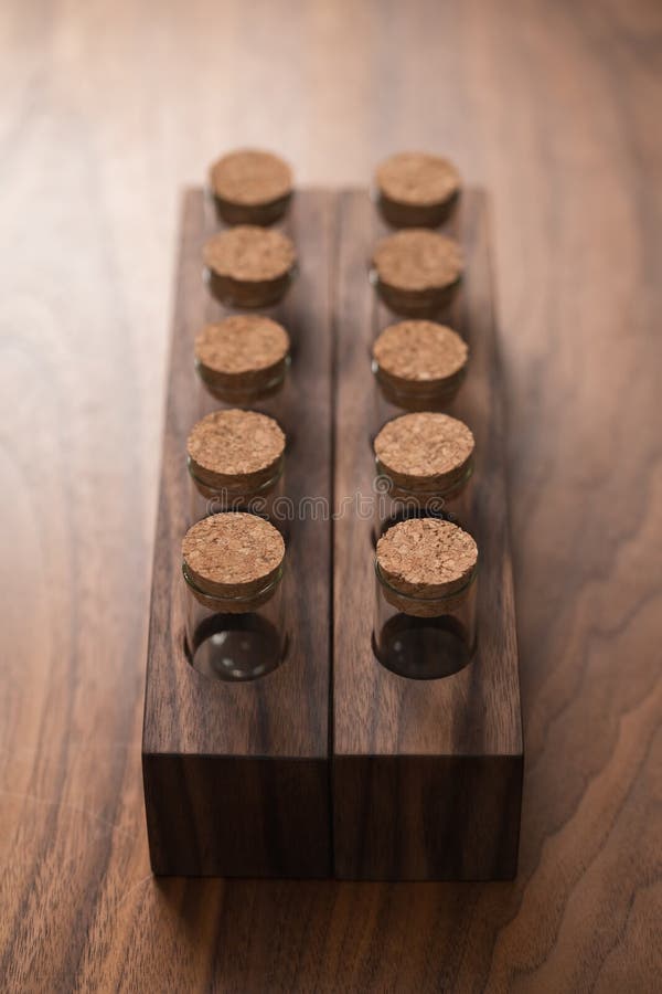 Empty Walnut Holder with Glass Tubes for Spices on Walnut Table Surface ...