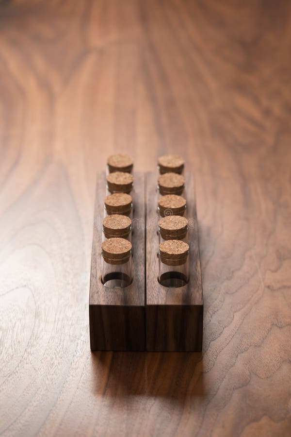 Empty Walnut Holder with Glass Tubes for Spices on Walnut Table Surface ...