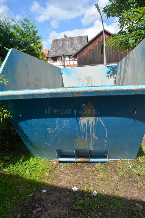 A Empty Waste Container in a Courtyard Stock Photo - Image of rubble ...