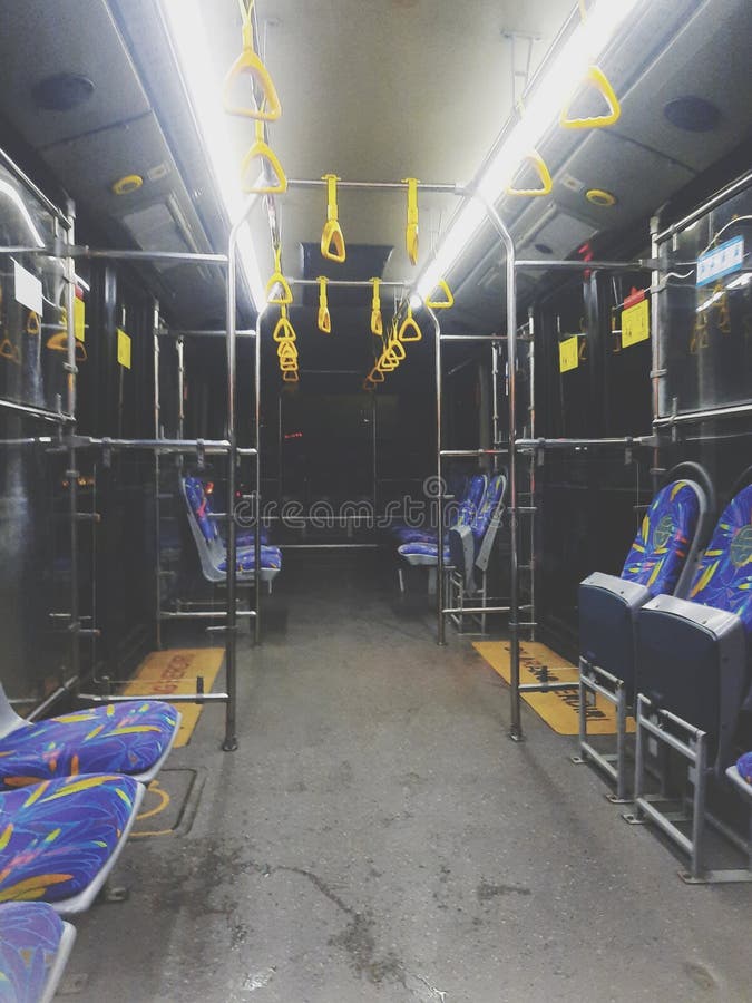 Empty wet bus stock photo. Image of machine, night, building - 258727728