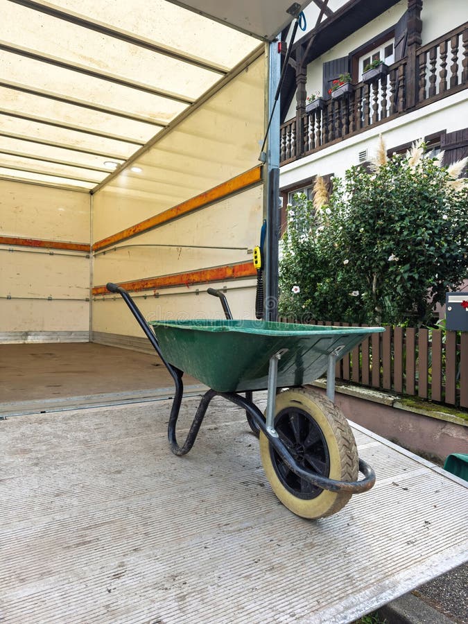 Empty Wheelbarrow on Truck Liftgate Ready for Loading Stock Photo - Image of liftgate, green ...