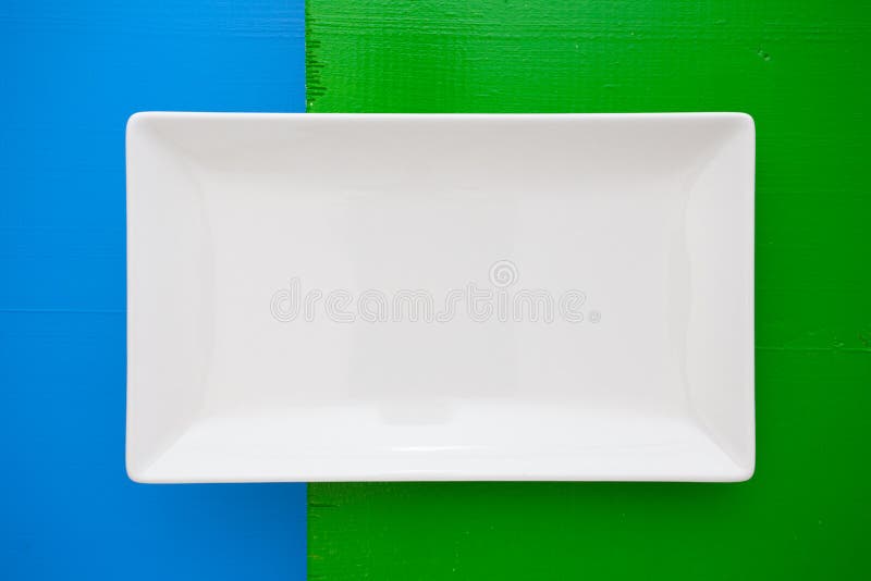 Empty White Ceramic Dish on Over Blue and Green Background, Rectangle ...