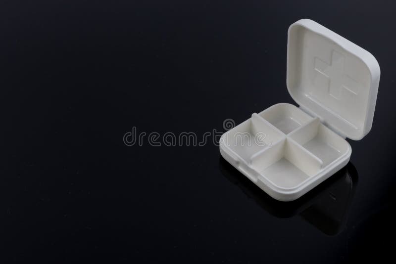 The Empty White Medicine Box on the Black Reflective Plate Stock Photo ...