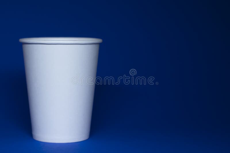 An Empty White Paper Cup on a Blue Background Stock Image - Image of ...