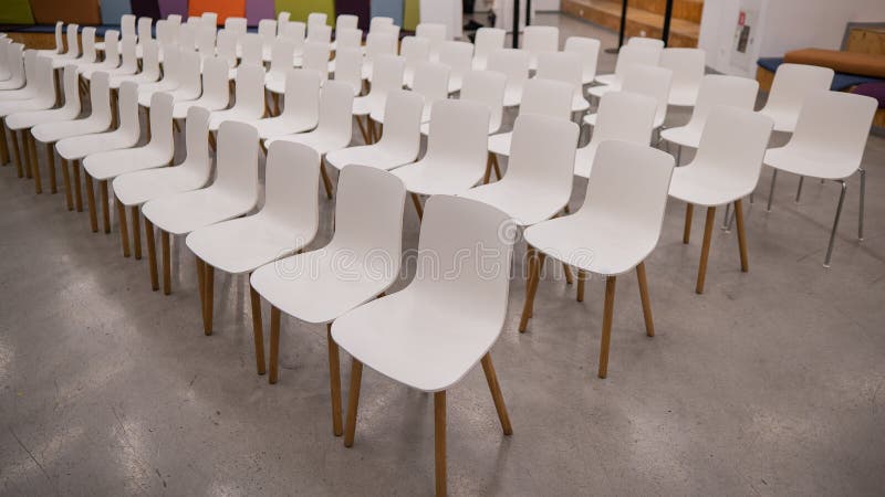 Empty White Plastic Chairs in a Conference Room. Stock Image - Image of ...