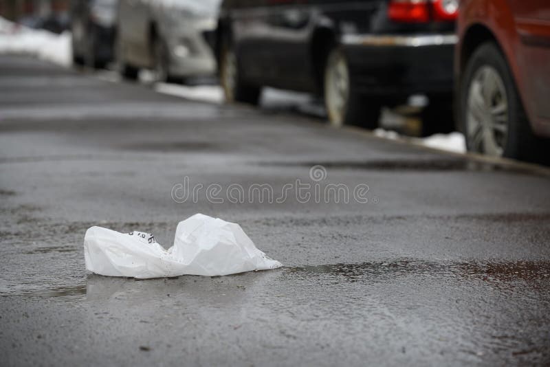 An Empty White Plastic or Plastic Bag is Lying on the Street. Plastic ...
