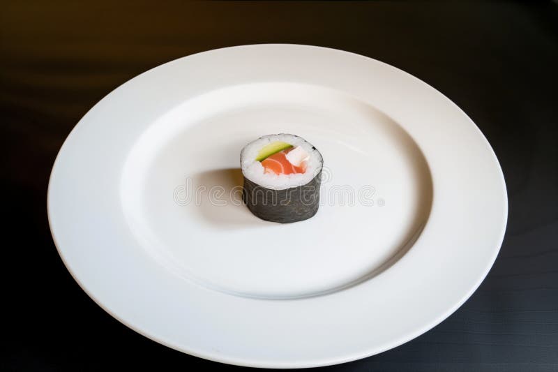 Empty White Plate with a Single Piece of Sushi in the Center Stock ...