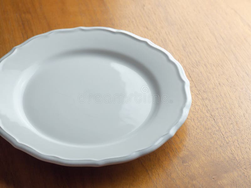 Empty White Plate on a Wooden Table Stock Image - Image of empty ...
