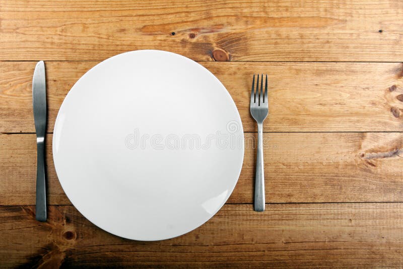 Empty White Plate on Wooden Table Stock Image - Image of knife, plank ...